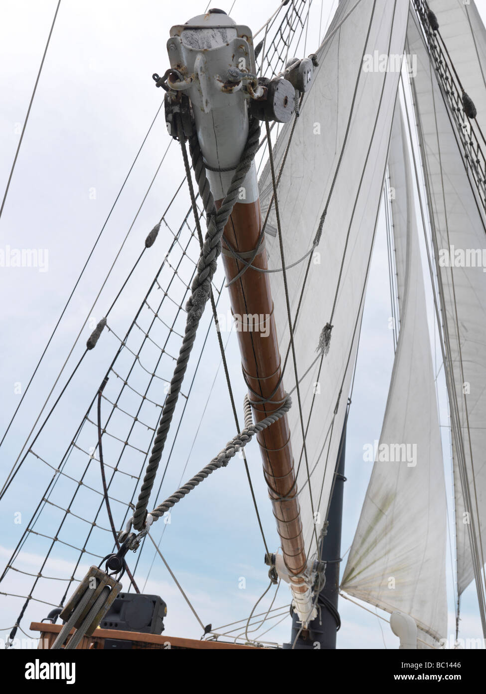Boom and sails of a topsail schooner Stock Photo - Alamy