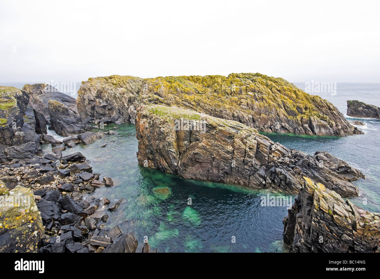 Sea stacks and cliffs at the Butt of Lewis on the Isle of Lewis in the ...