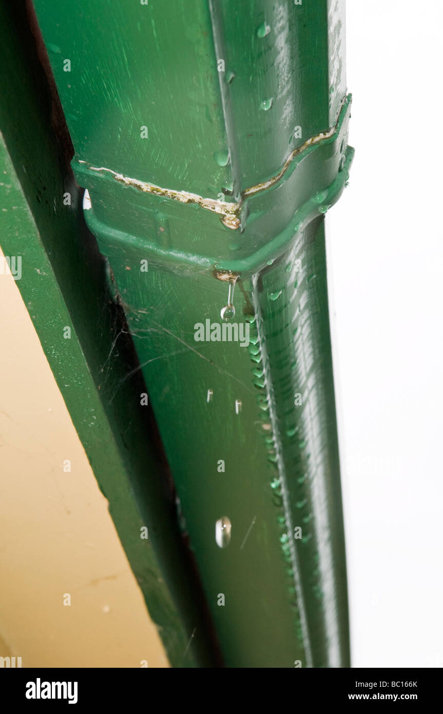 Water drips from a leaking gutter Stock Photo - Alamy