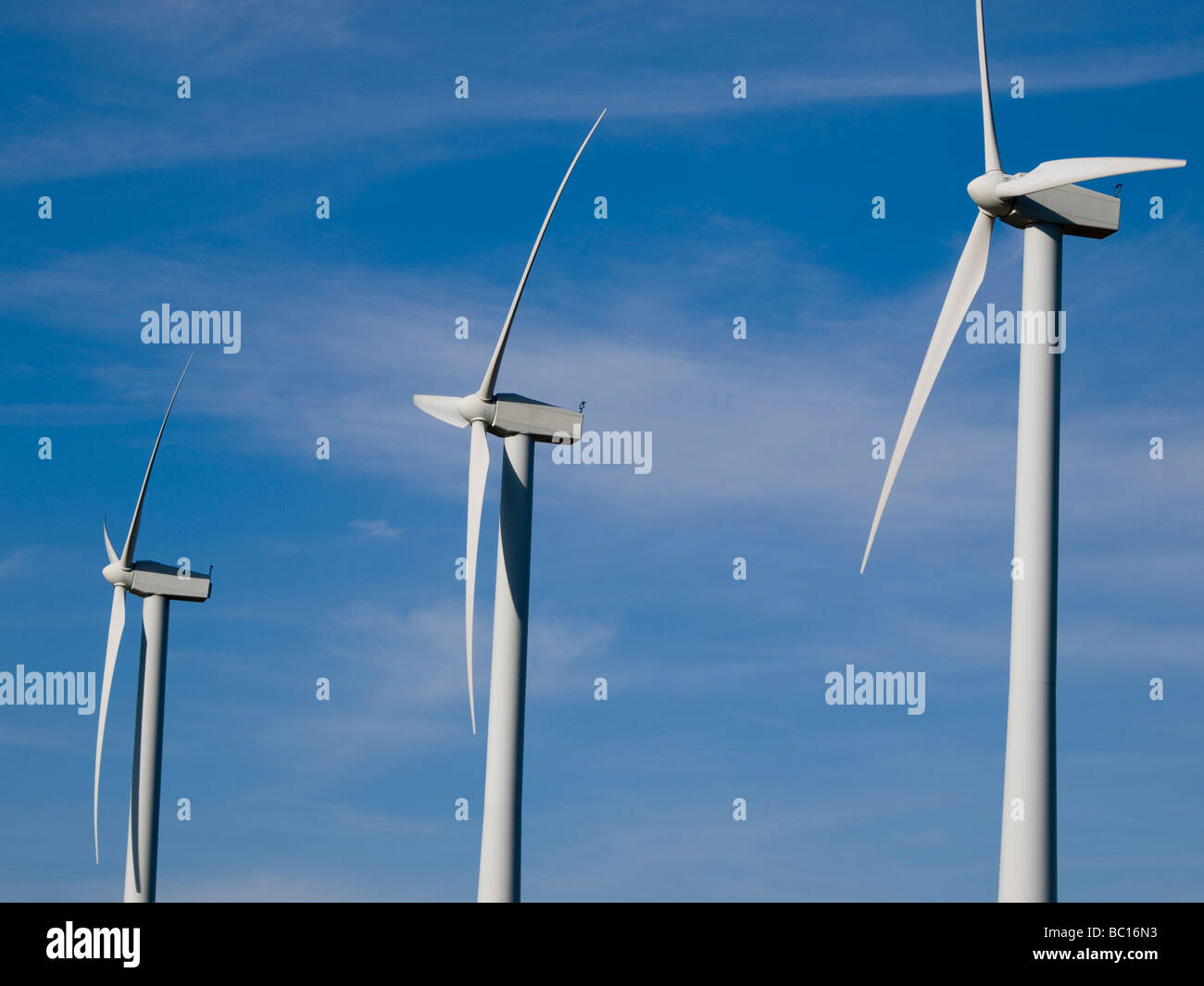 Windmills for electric power at work Stock Photo - Alamy