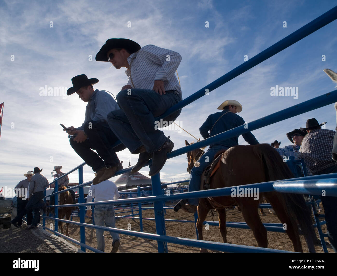 Two cowboys talk while waiting to compete in the Tucson Rodeo Stock ...