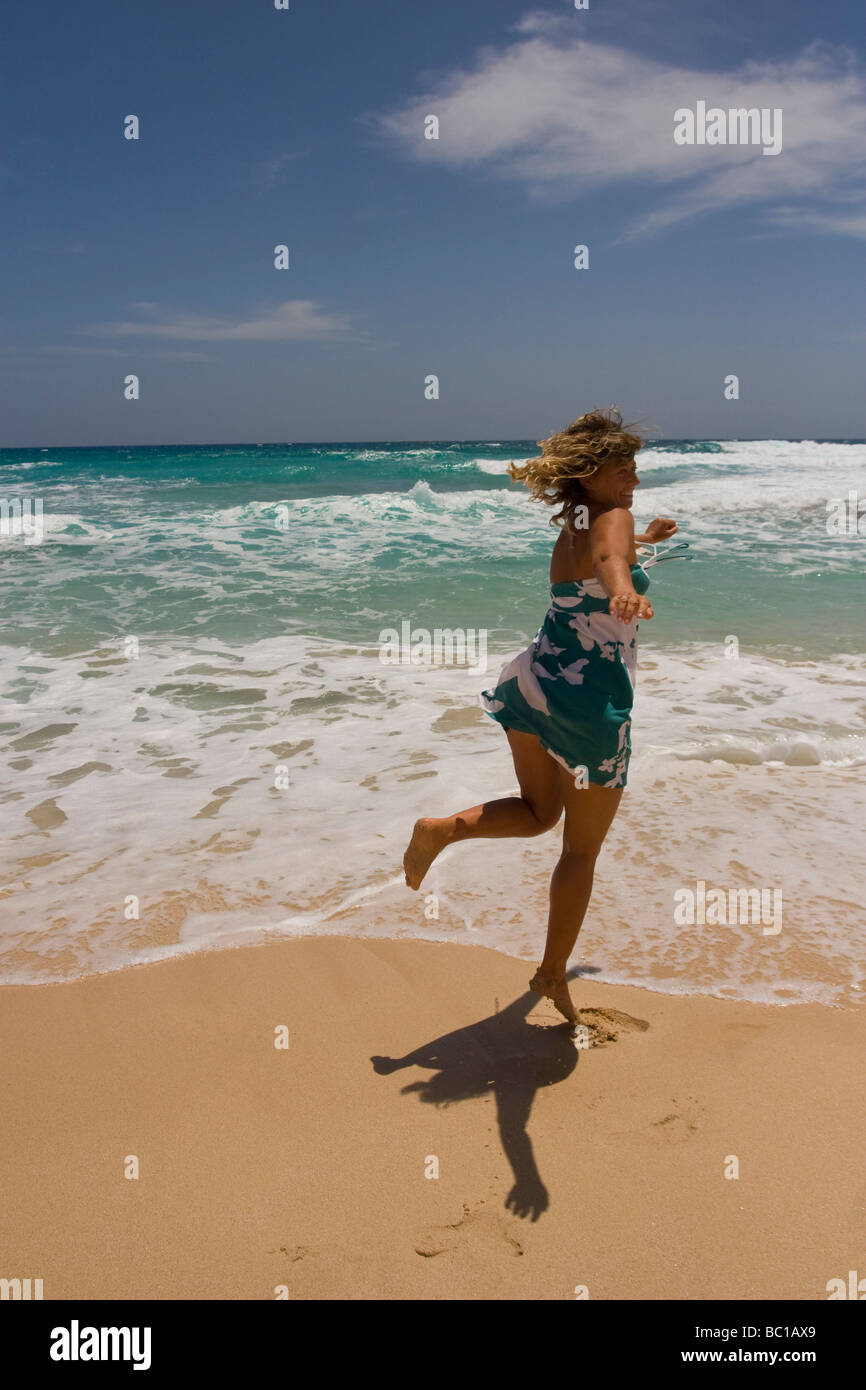 A happy girl on the beach Stock Photo - Alamy