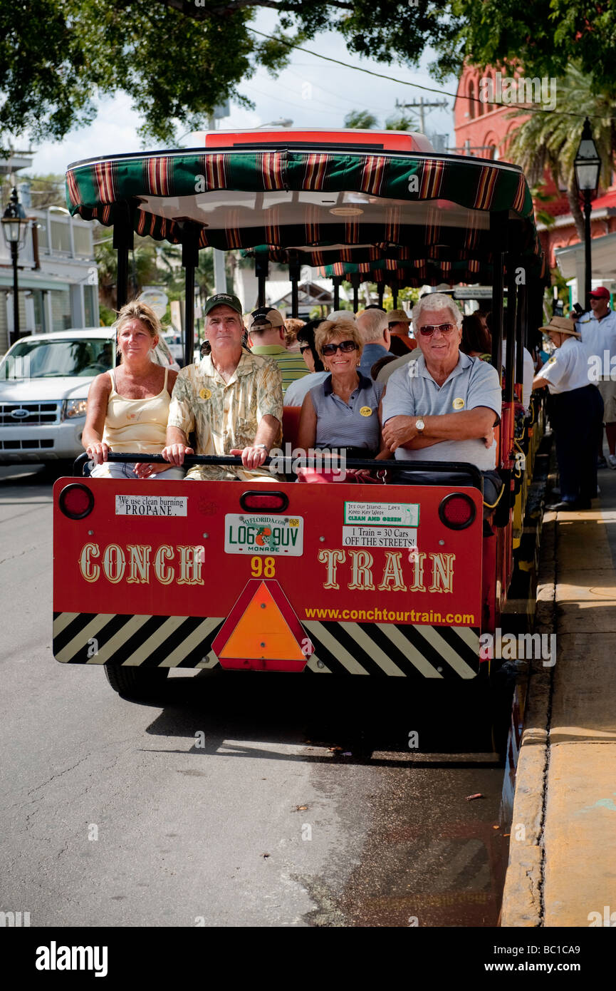 Tourists on a Conch Train in down-town Key West Florida Stock Photo - Alamy