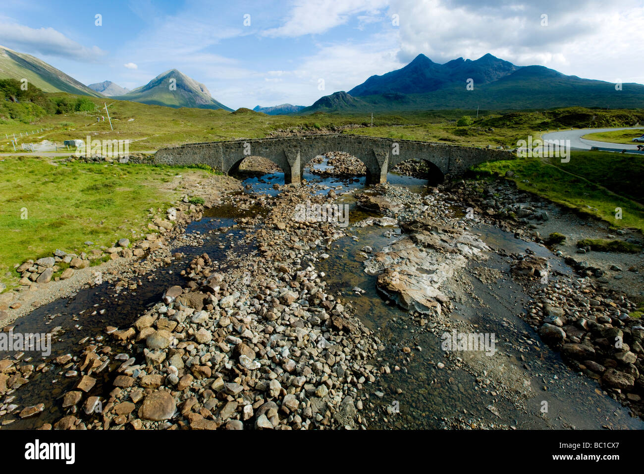 Stone bridge over the river Sligachan towards the Cuillin Hills Isle of ...