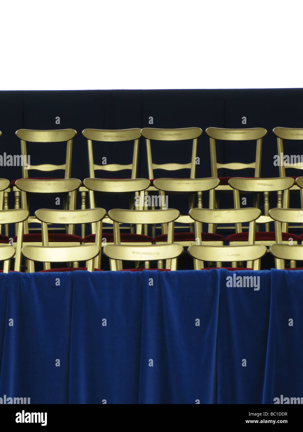 rows of gold chairs for vip at an outdoor parade event Stock Photo - Alamy