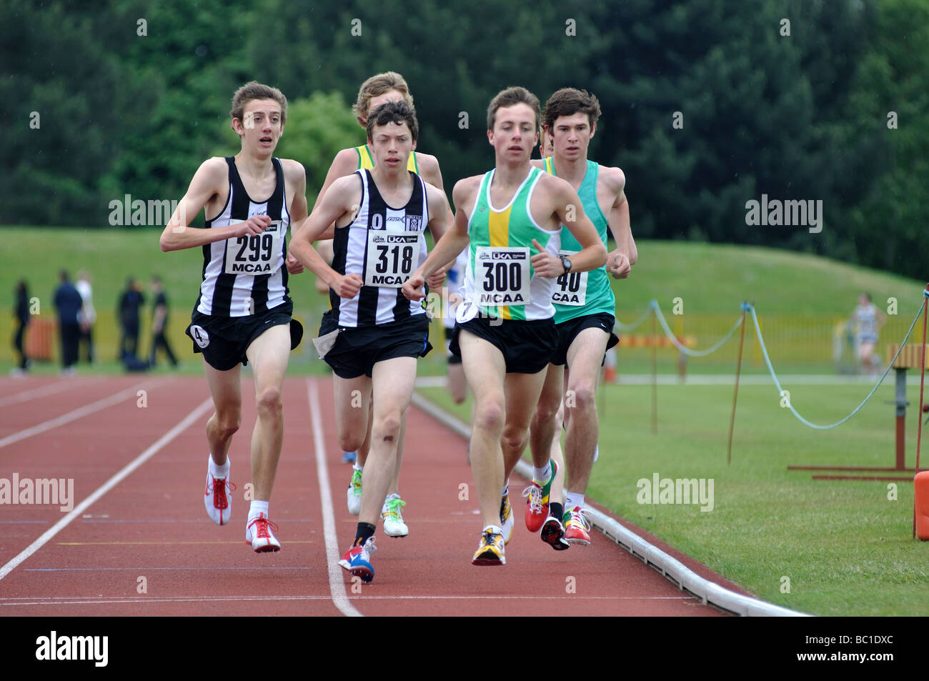 Runners in a middle distance track race, UK Stock Photo - Alamy