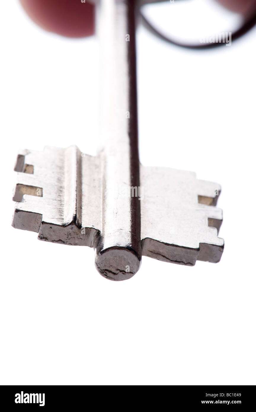 object on white metal key close up Stock Photo - Alamy