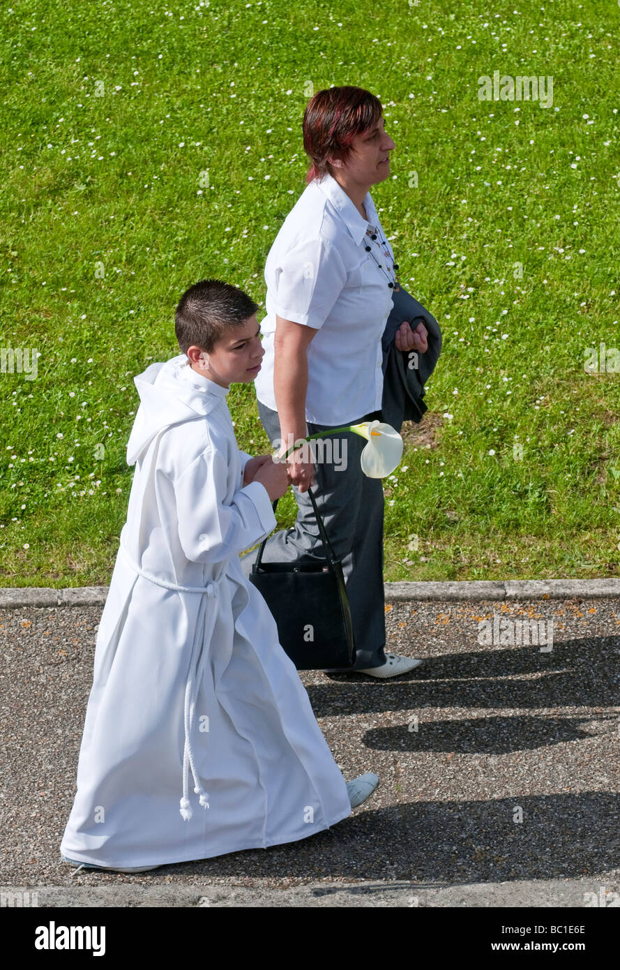 Mother and son dressed for First Holy Communion - France Stock Photo ...