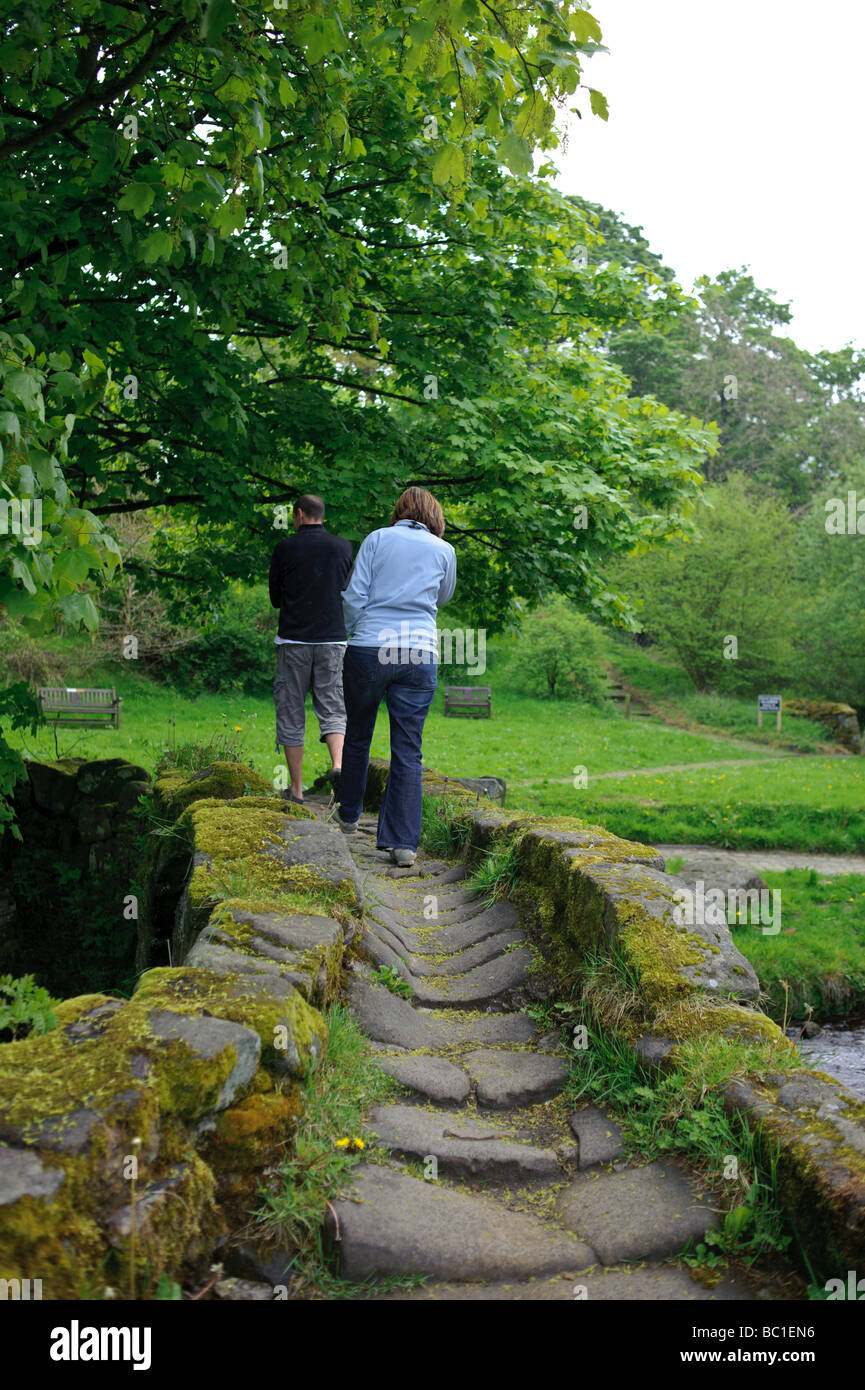 Couple walking across a bridge hi-res stock photography and images - Alamy