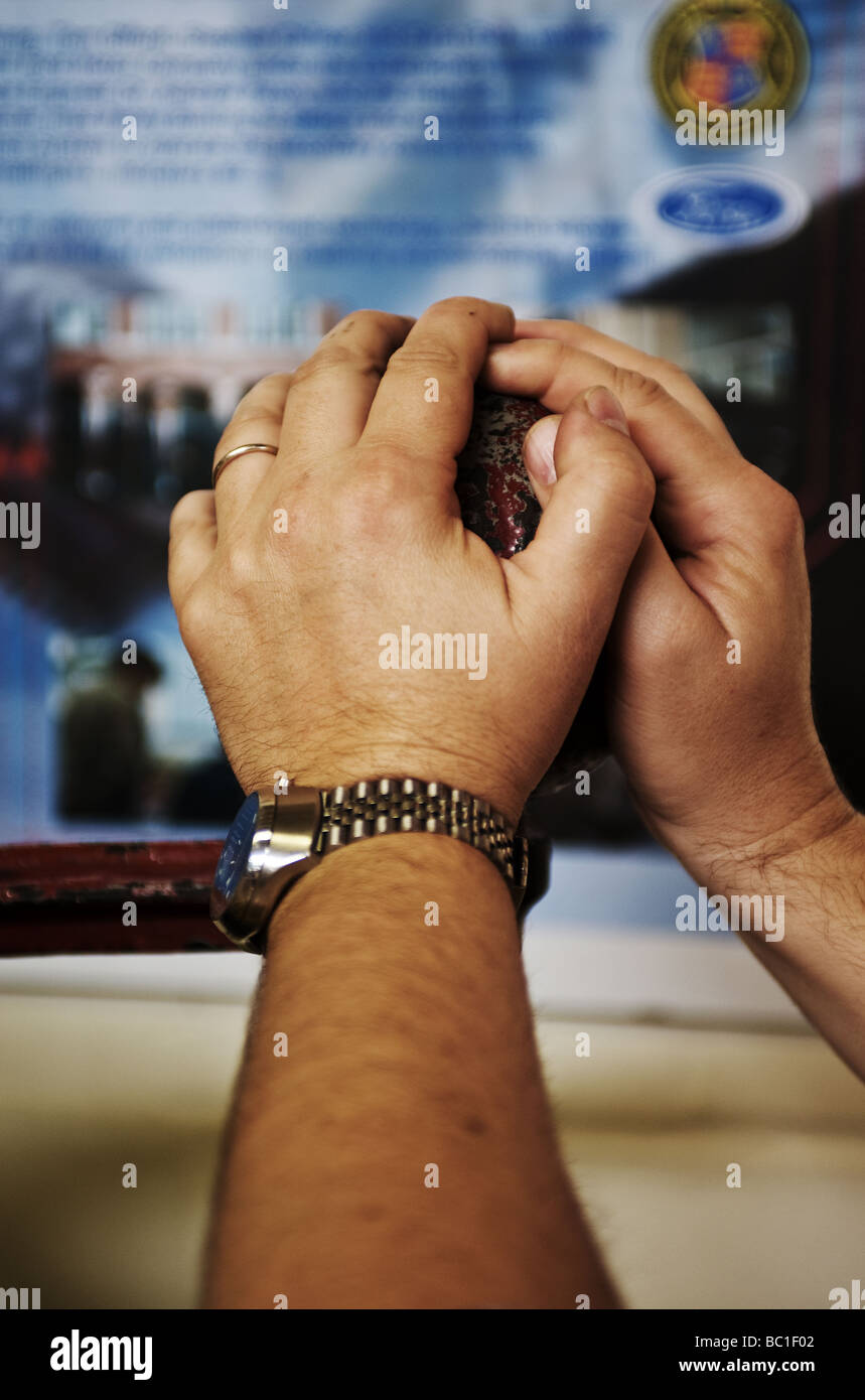 Hands grasping hi-res stock photography and images - Alamy