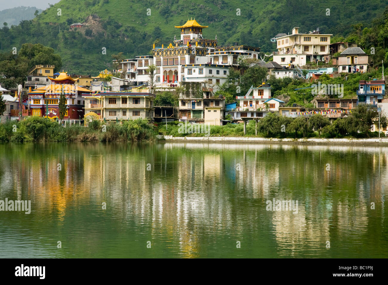 Rewalsar lake, with town settlement on the hillside. Himachal Pradesh ...