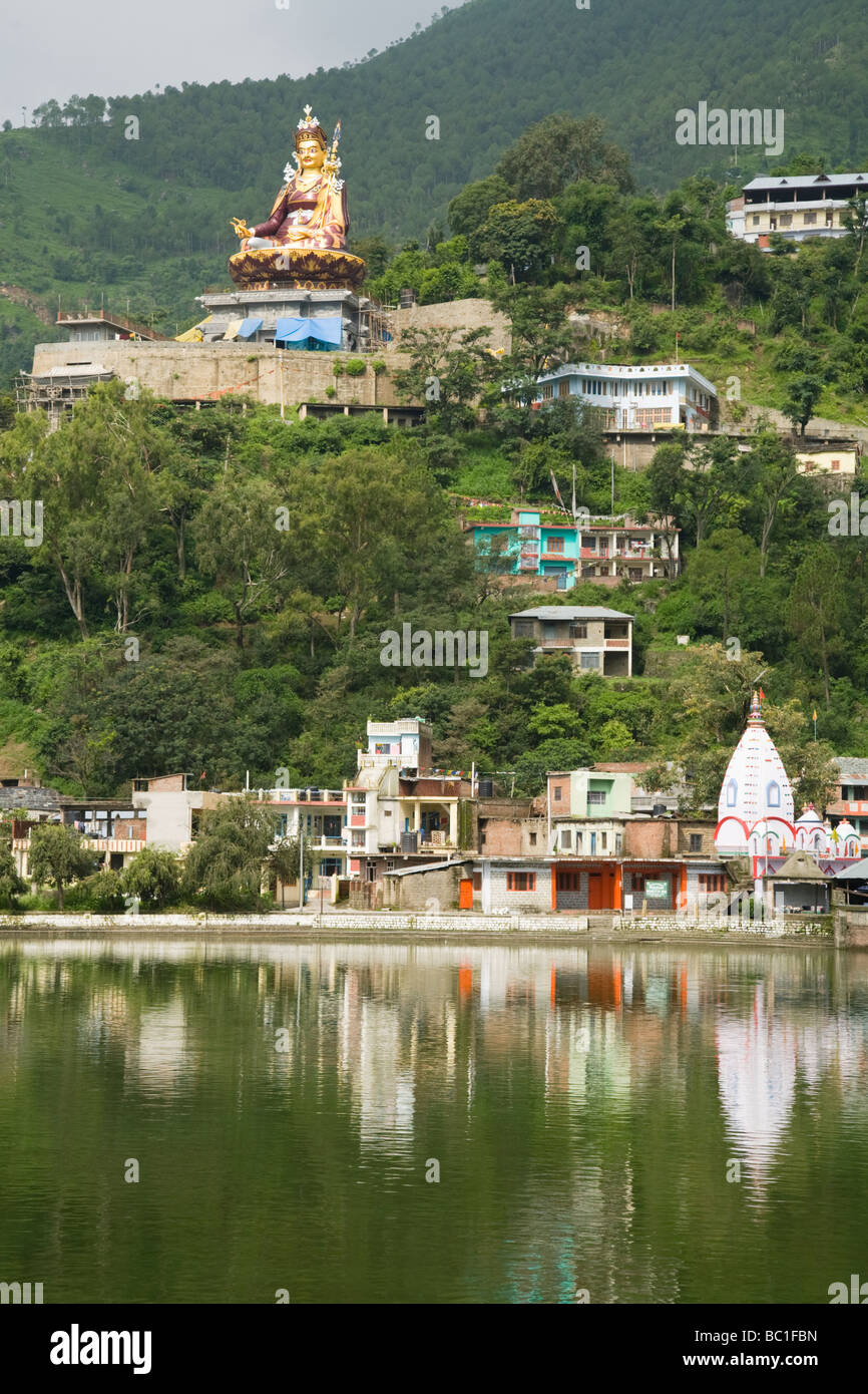 Rewalsar lake, with statue of Acharya Padmasambhav on the hillside ...