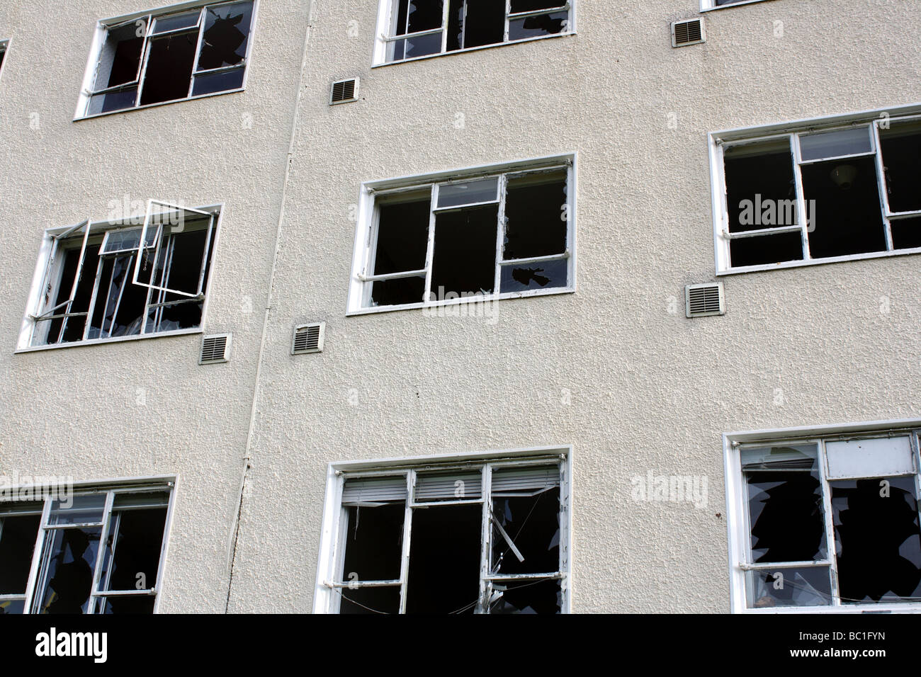 City council flats witch broken windows, devastated building before ...