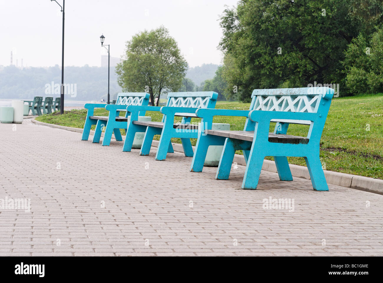 Blue color city benches Stock Photo - Alamy