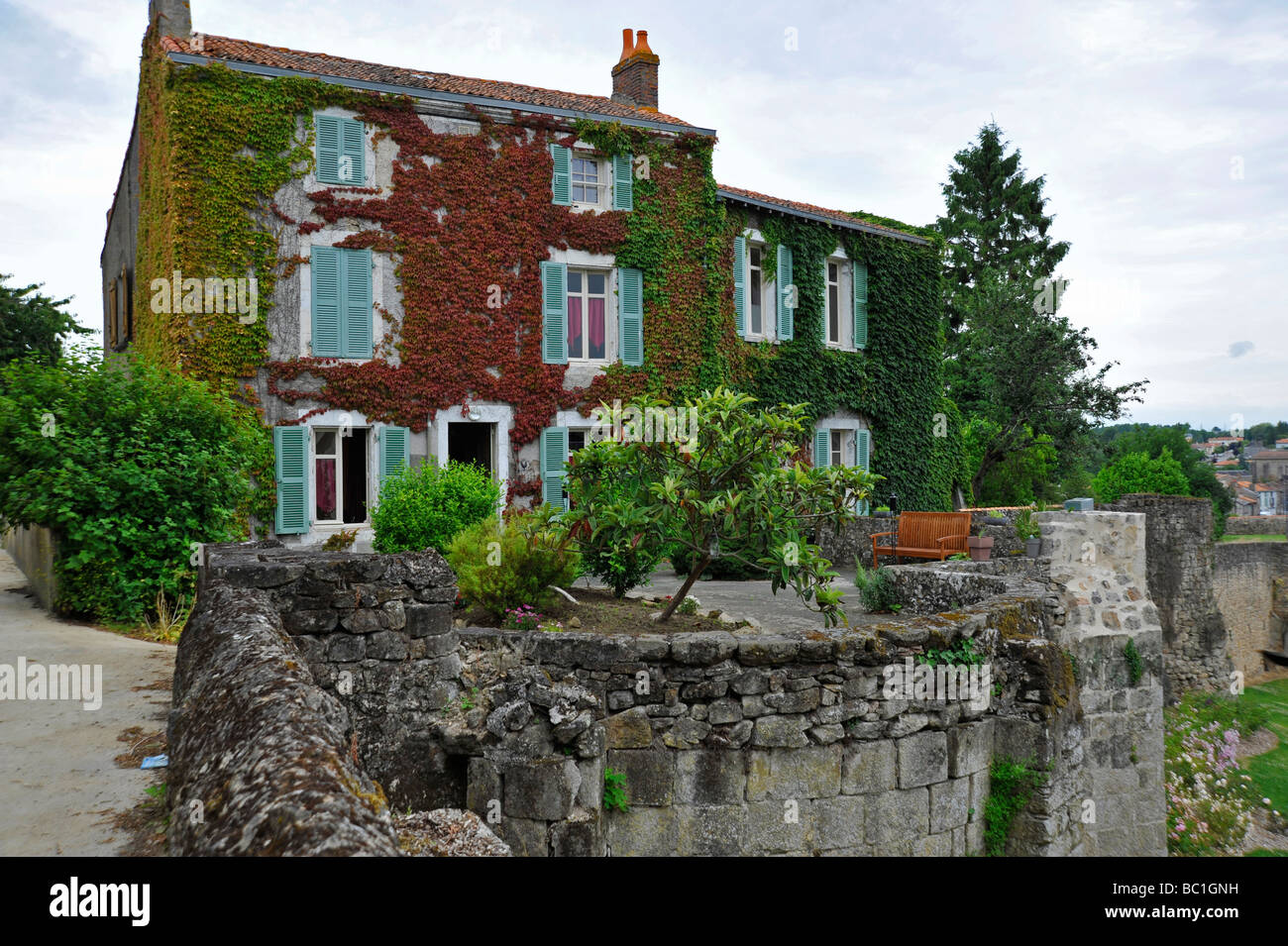 Old historic house in battlement walls, Parthenay. Deux-Sevres, France ...