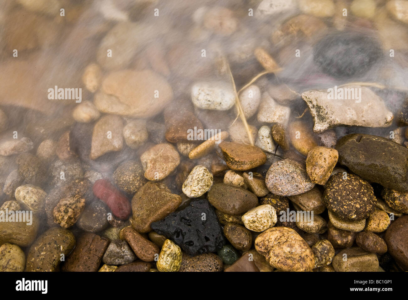 Water flows over stones hi-res stock photography and images - Alamy