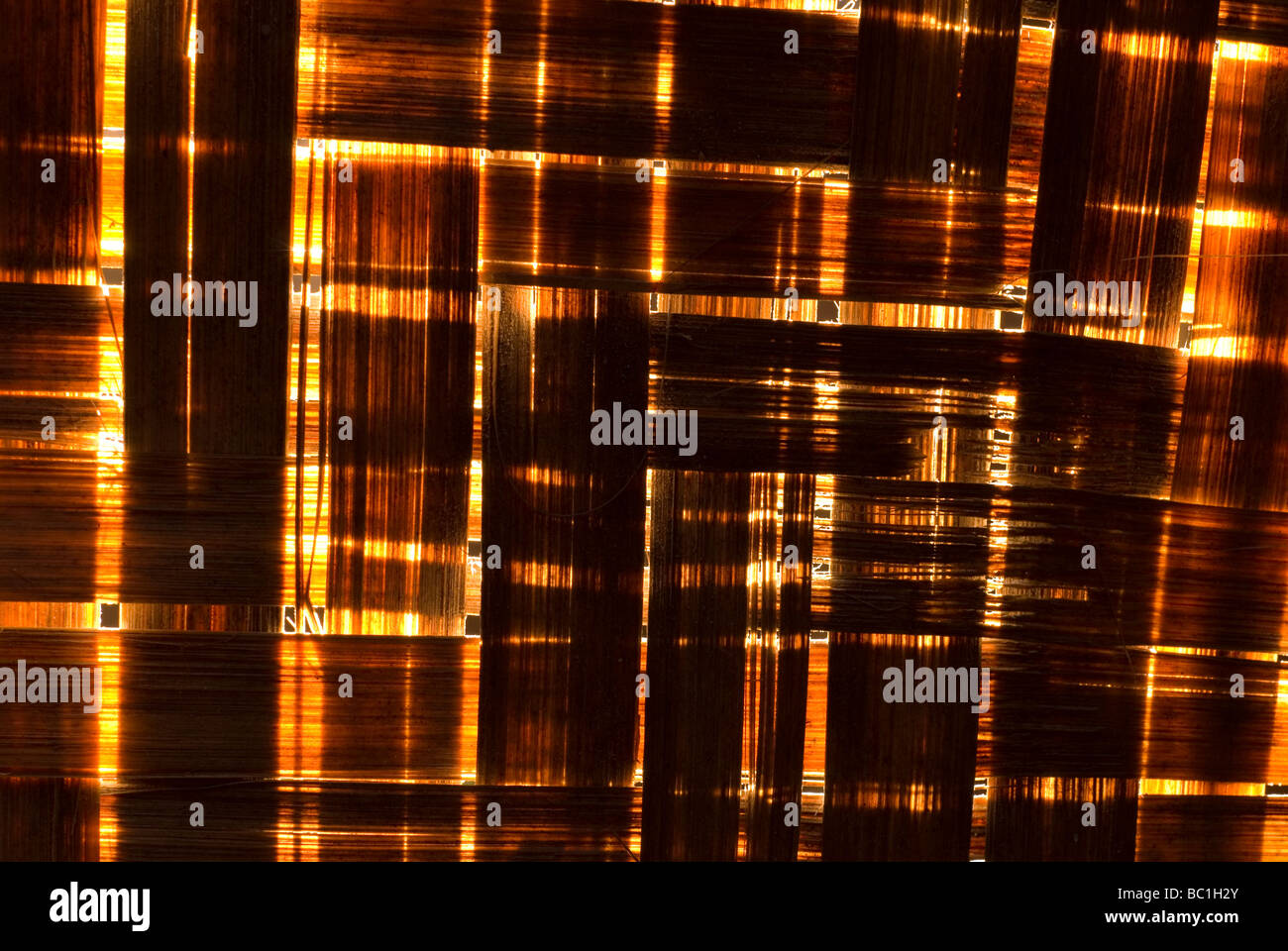 Back lit straw mat wall (close-up Stock Photo - Alamy