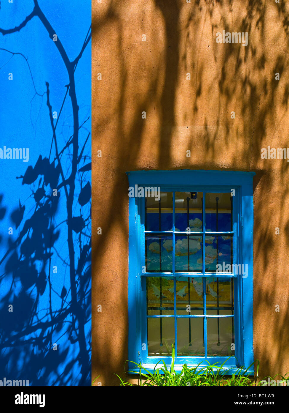 Blue shadows & blue window Stock Photo - Alamy