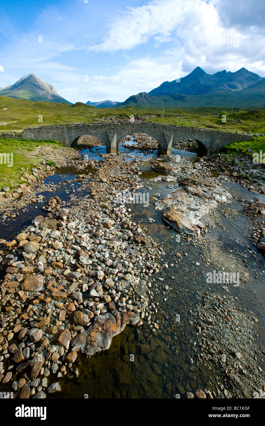 Stone bridge over the river Sligachan towards the Cuillin Hills Isle of ...