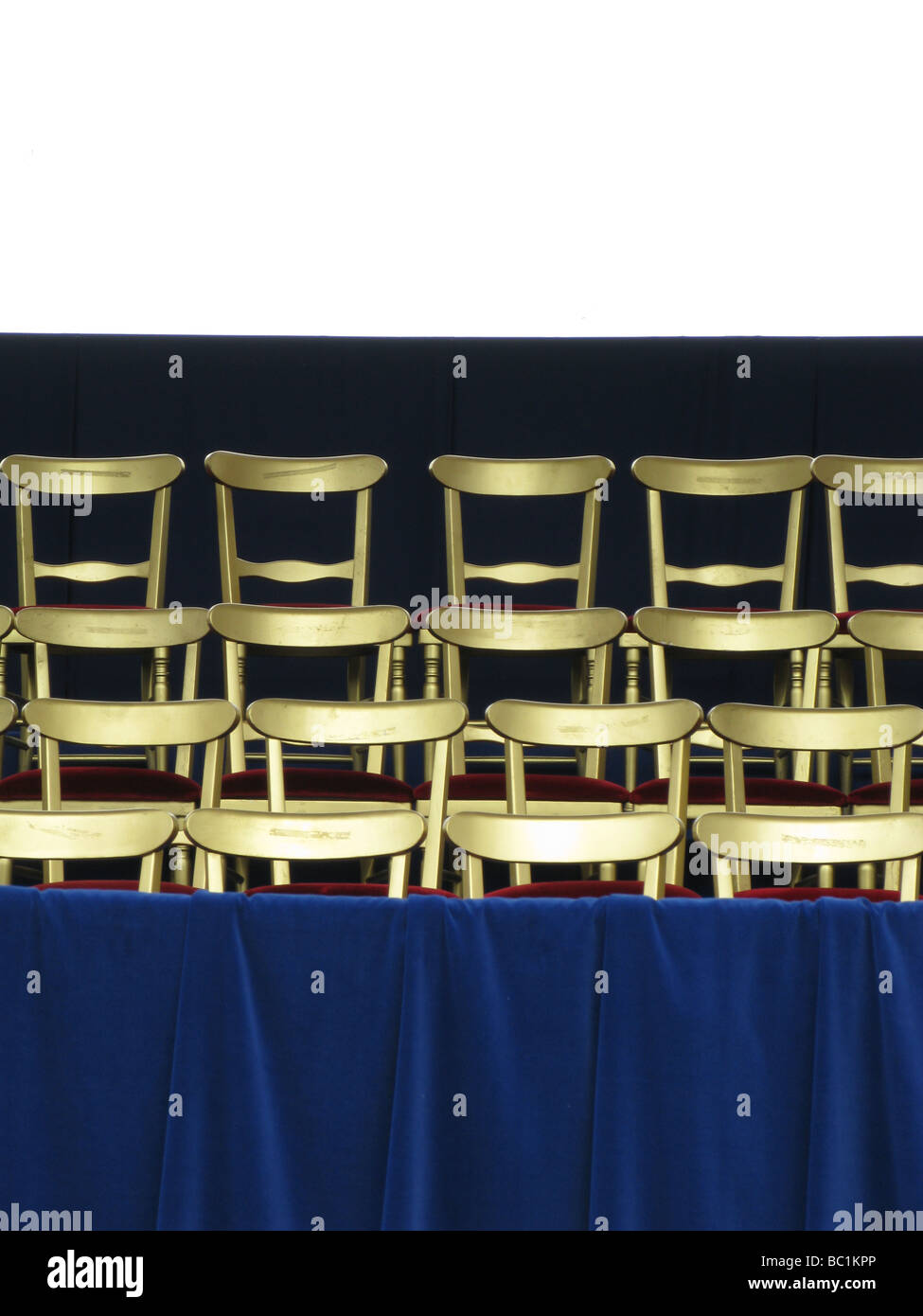 rows of gold chairs for vip at an outdoor parade event Stock Photo - Alamy