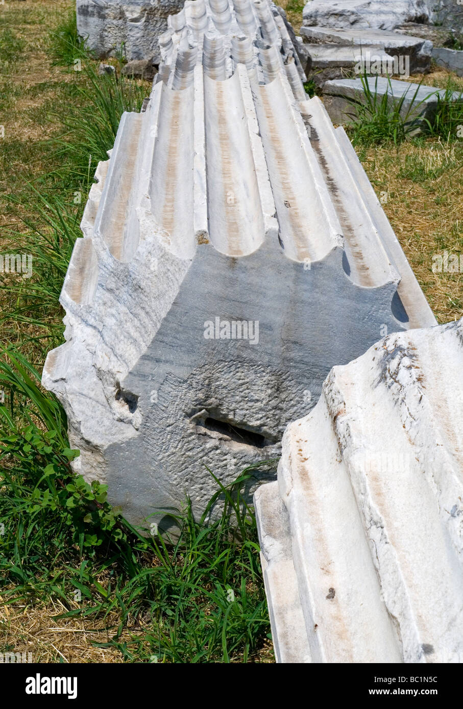 Ruined stone columns lying on the ground in the Agora an ancient Greek ...