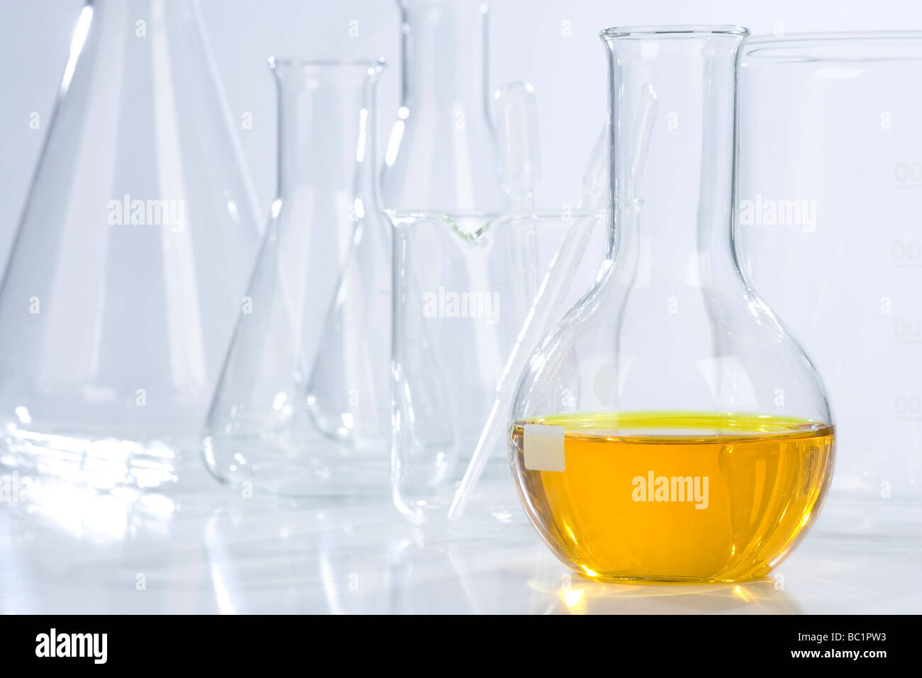 Glass laboratory equipment for science research Stock Photo - Alamy