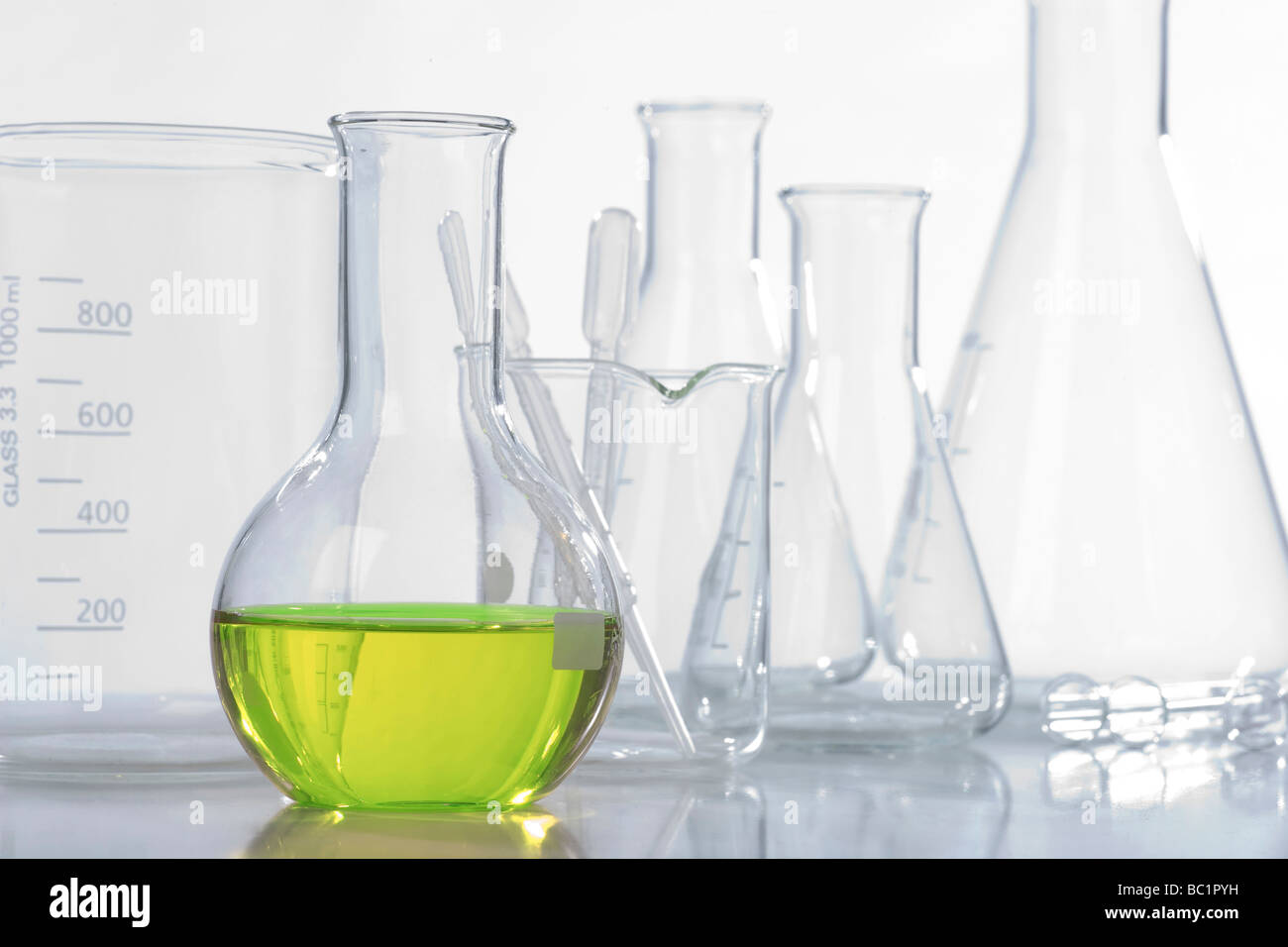 Glass laboratory equipment for science research Stock Photo - Alamy