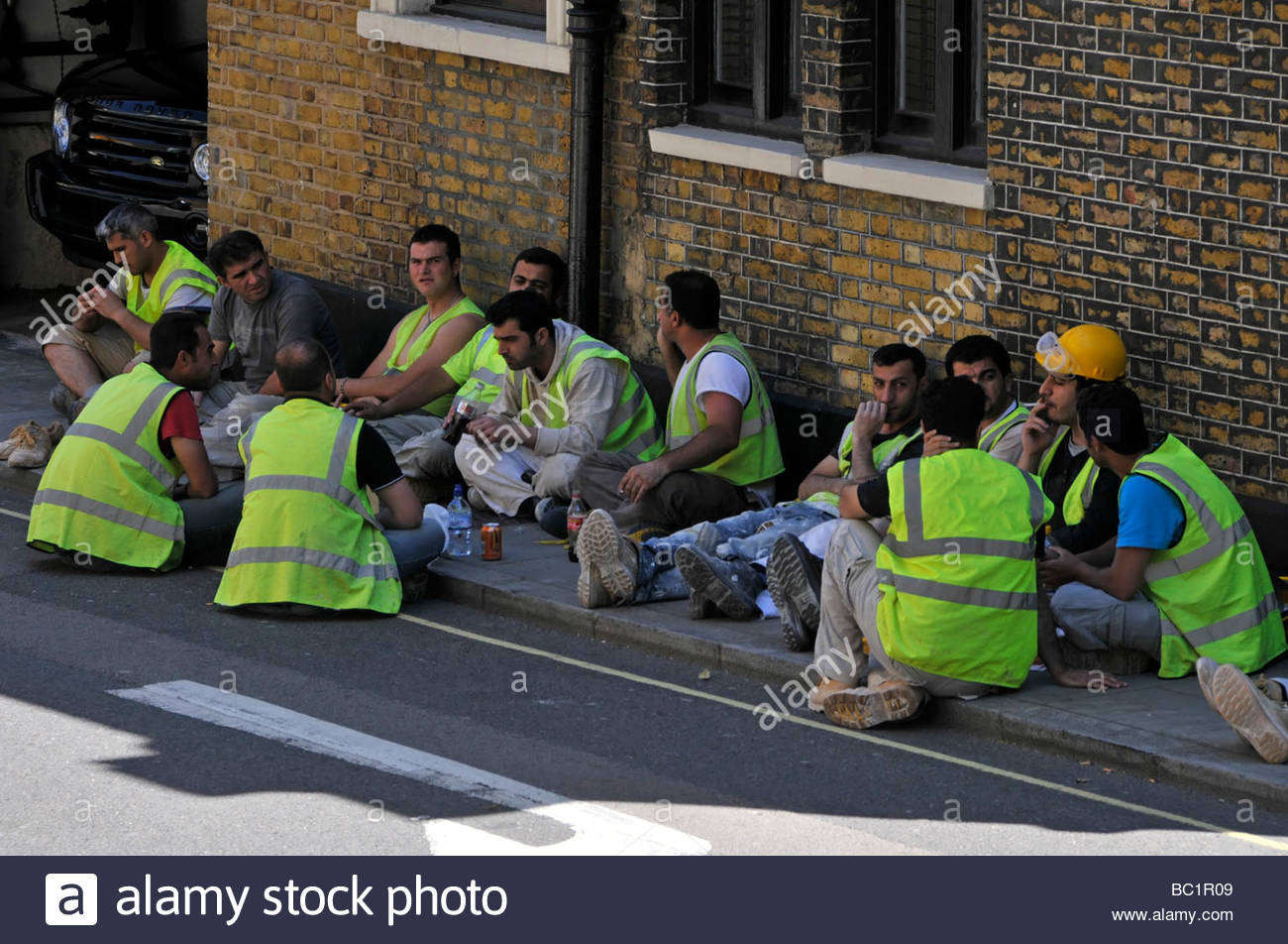 Building Site Workers Sitting On Stock Photos & Building Site Workers ...