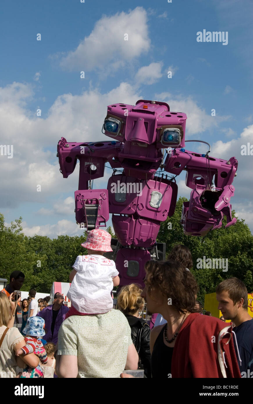 Giant motor controlled robot made out of pink garbage or rubbish bins ...