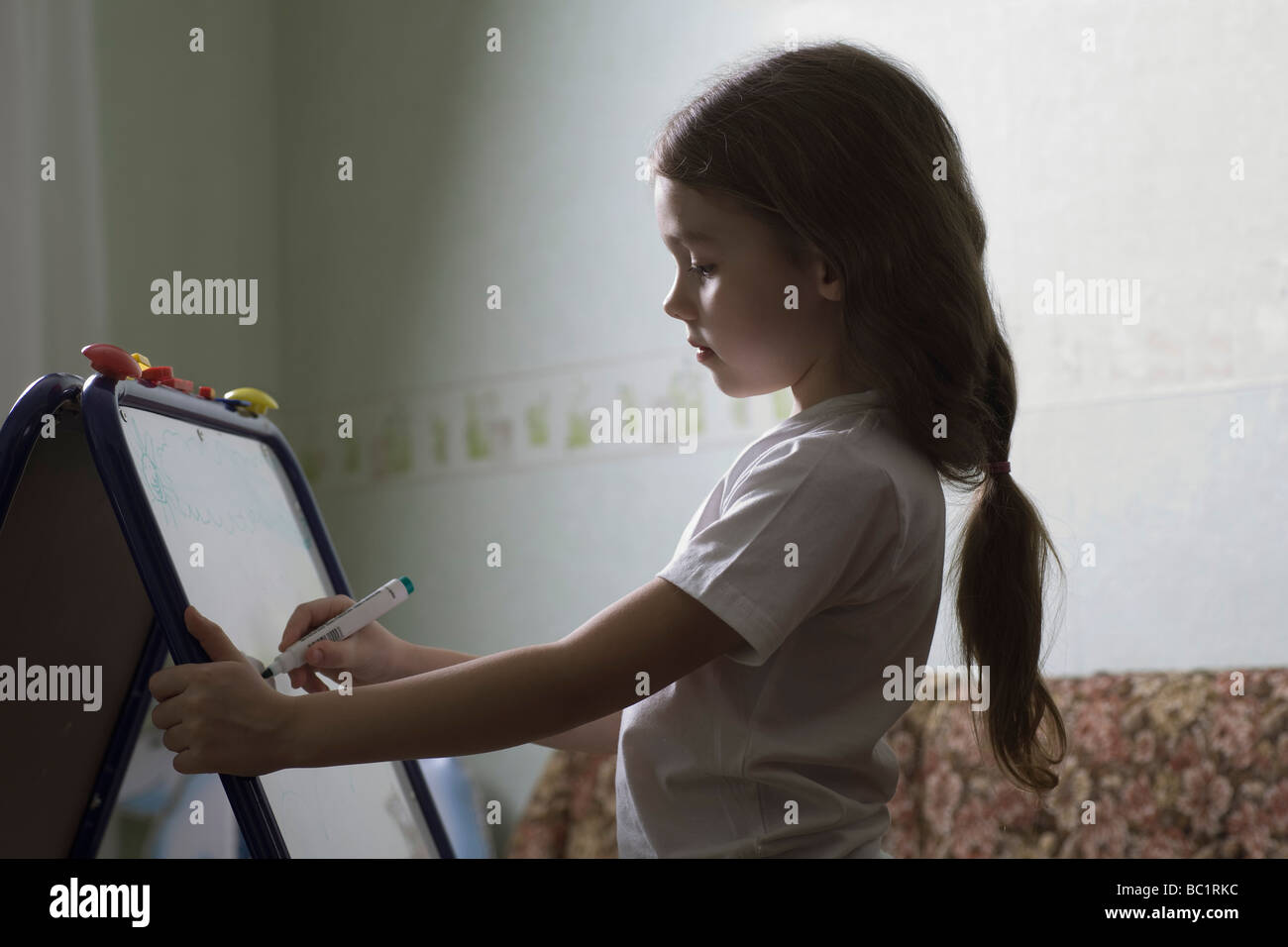 Girl drawing on plastic hi-res stock photography and images - Alamy