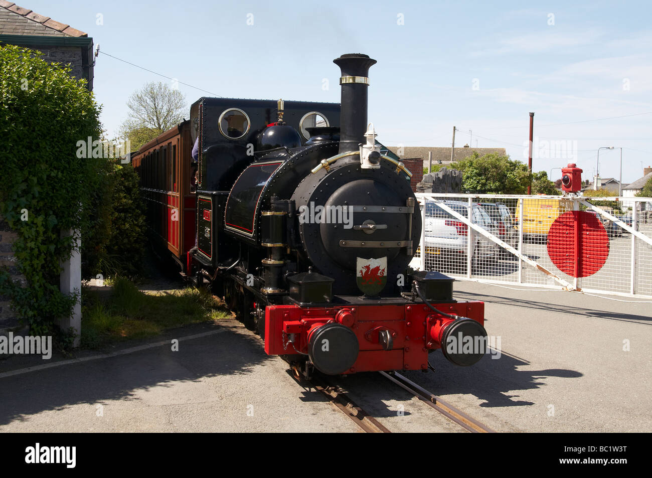 Talyllyn Railway locomotive No 1 "Talyllyn" on the level crossing at ...