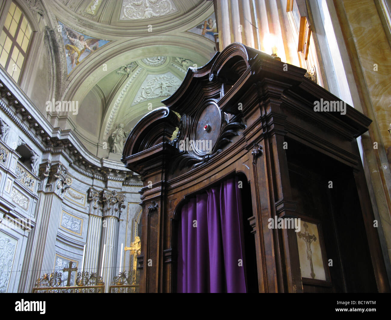 confession box inside church in rome italy Stock Photo - Alamy