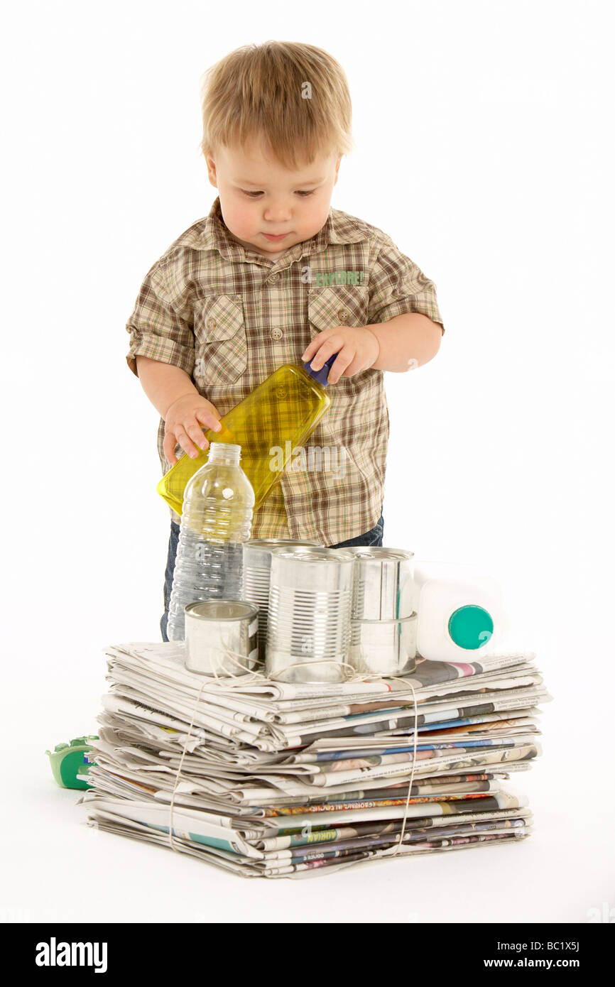 Young Boy Recycling In Studio Stock Photo - Alamy