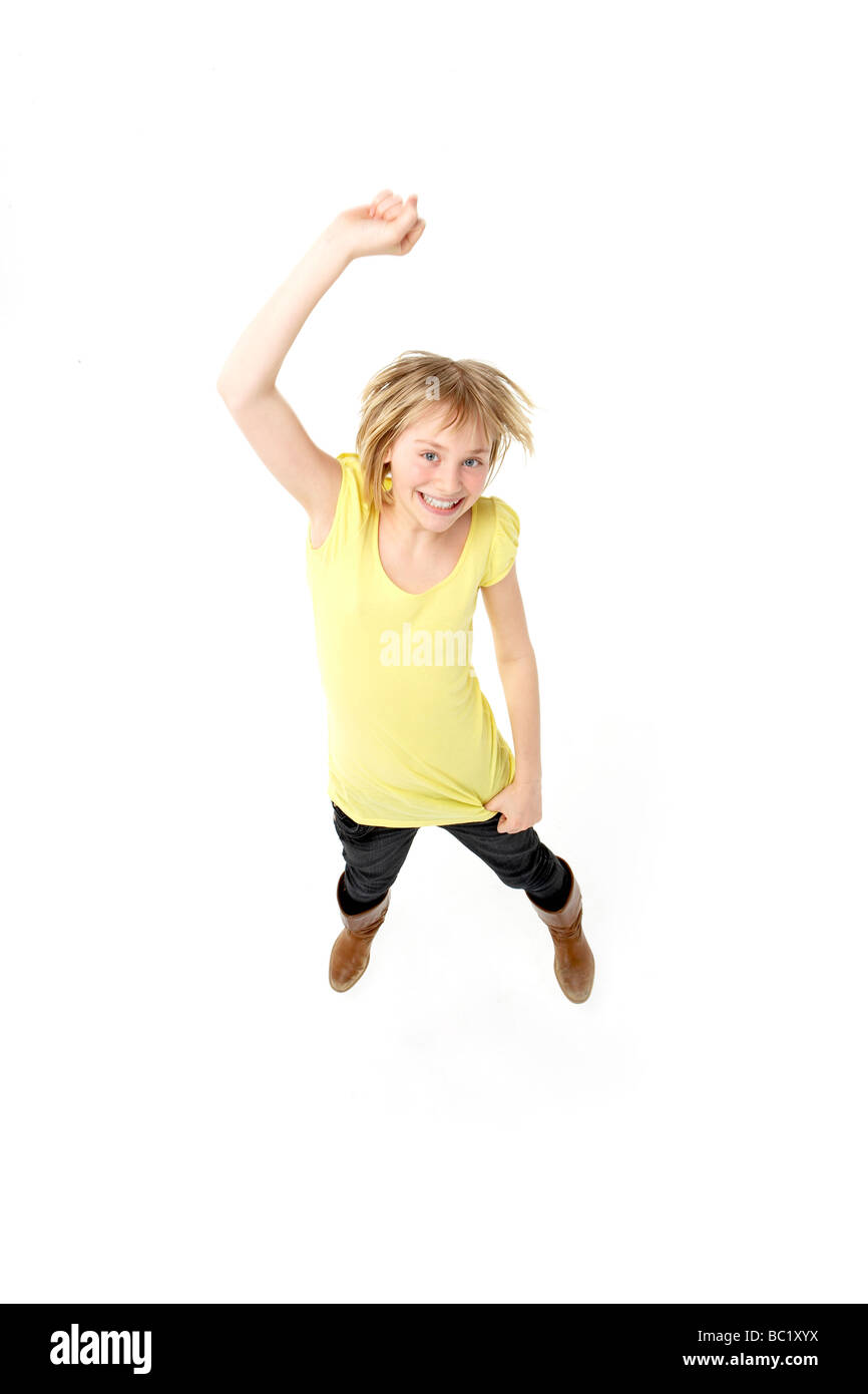 Young Girl Leaping In Studio Stock Photo - Alamy