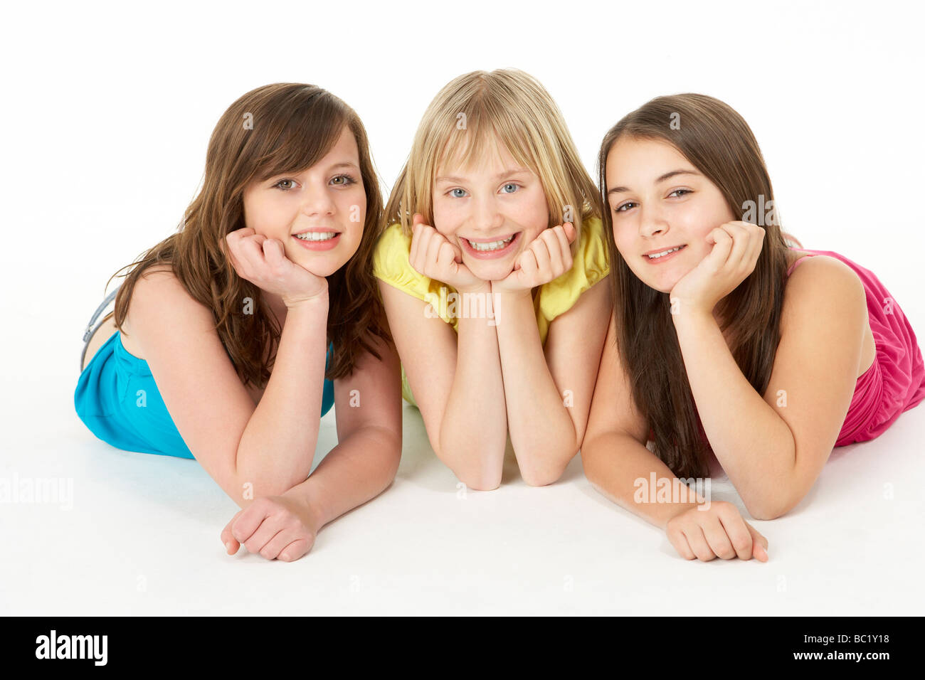 Group Of Three Young Girls In Studio Stock Photo - Alamy
