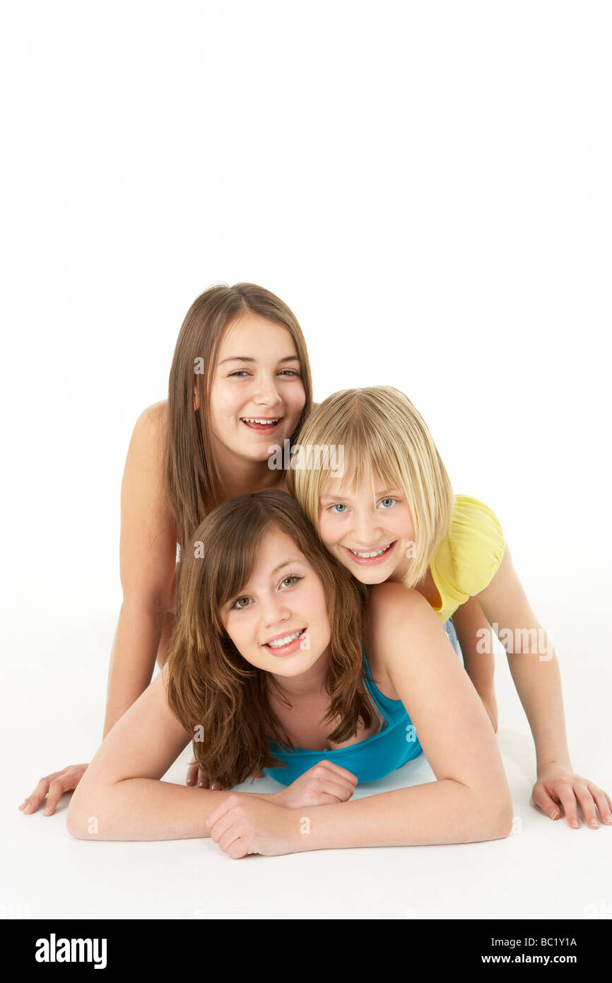 Group Of Three Young Girls In Studio Stock Photo - Alamy