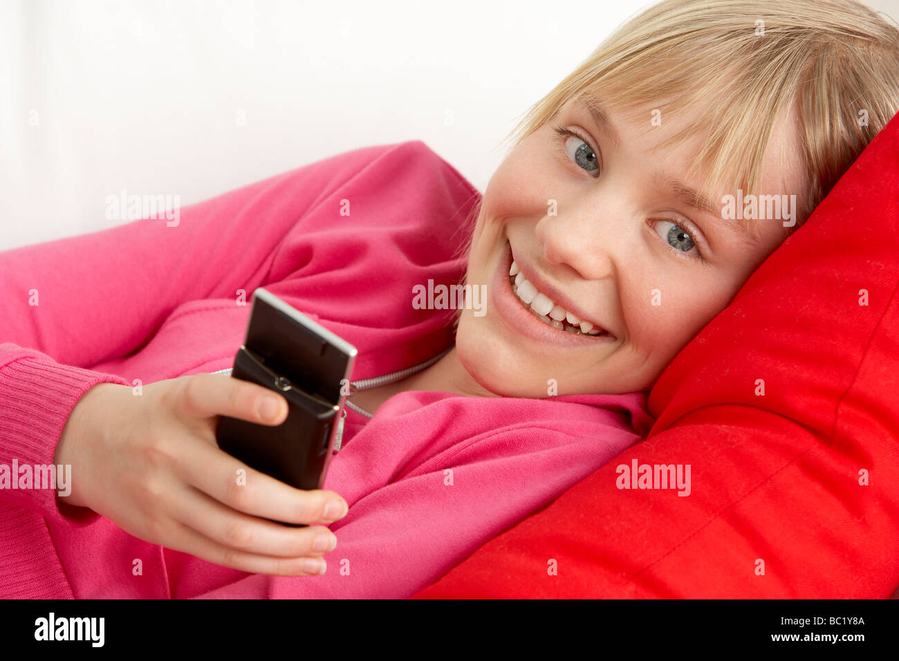 Young Girl Reading Text Message Stock Photo - Alamy