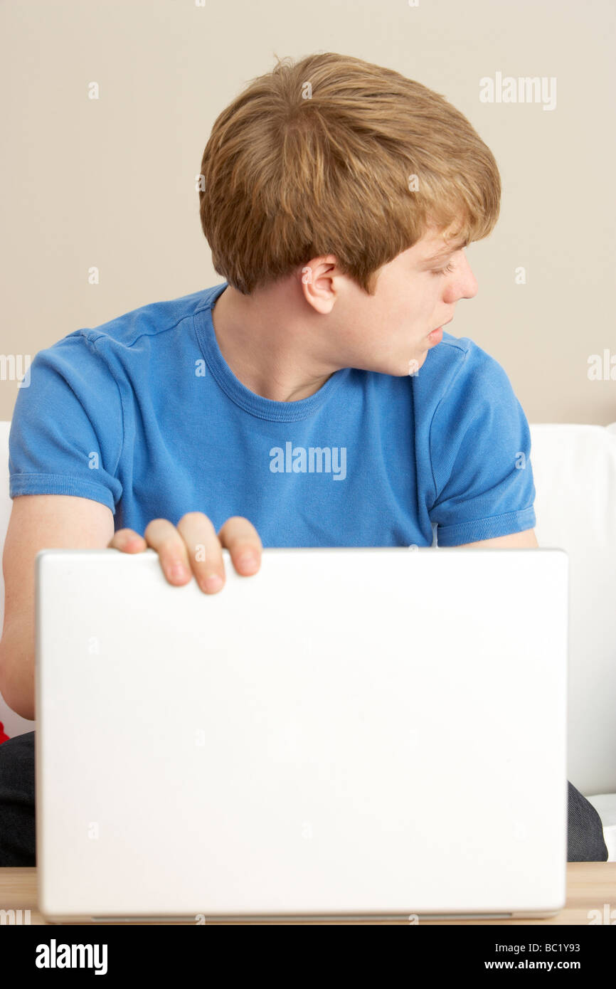 Worried Looking Boy Using Laptop Stock Photo - Alamy