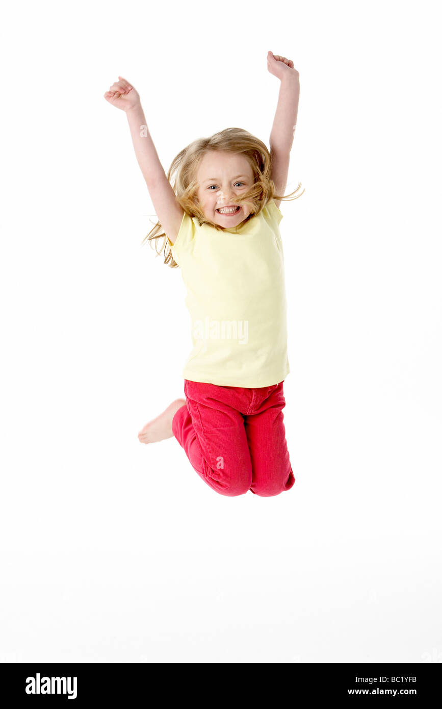 Leaping fit girl Cut Out Stock Images & Pictures - Alamy