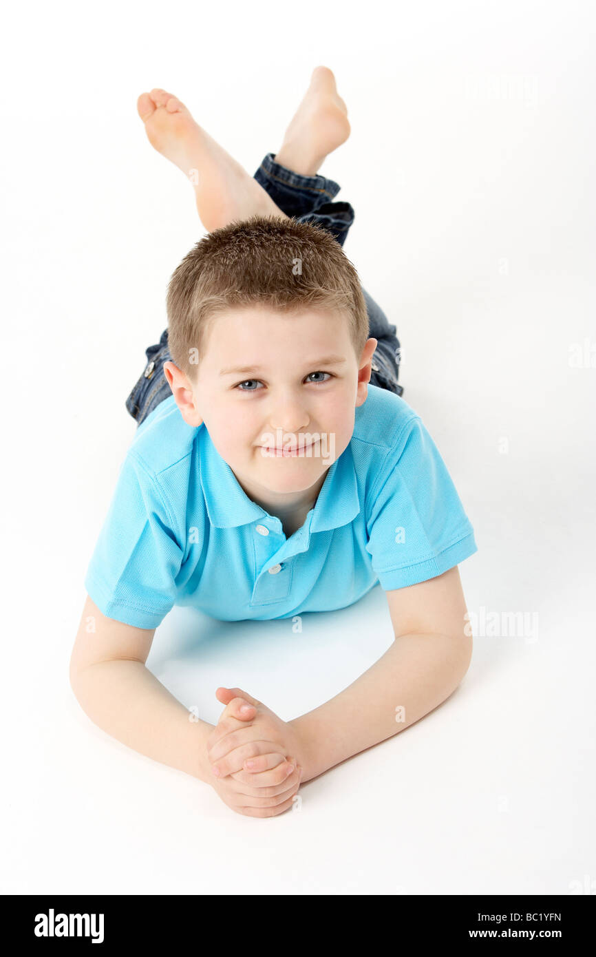 Boy lying on stomach hi-res stock photography and images - Alamy