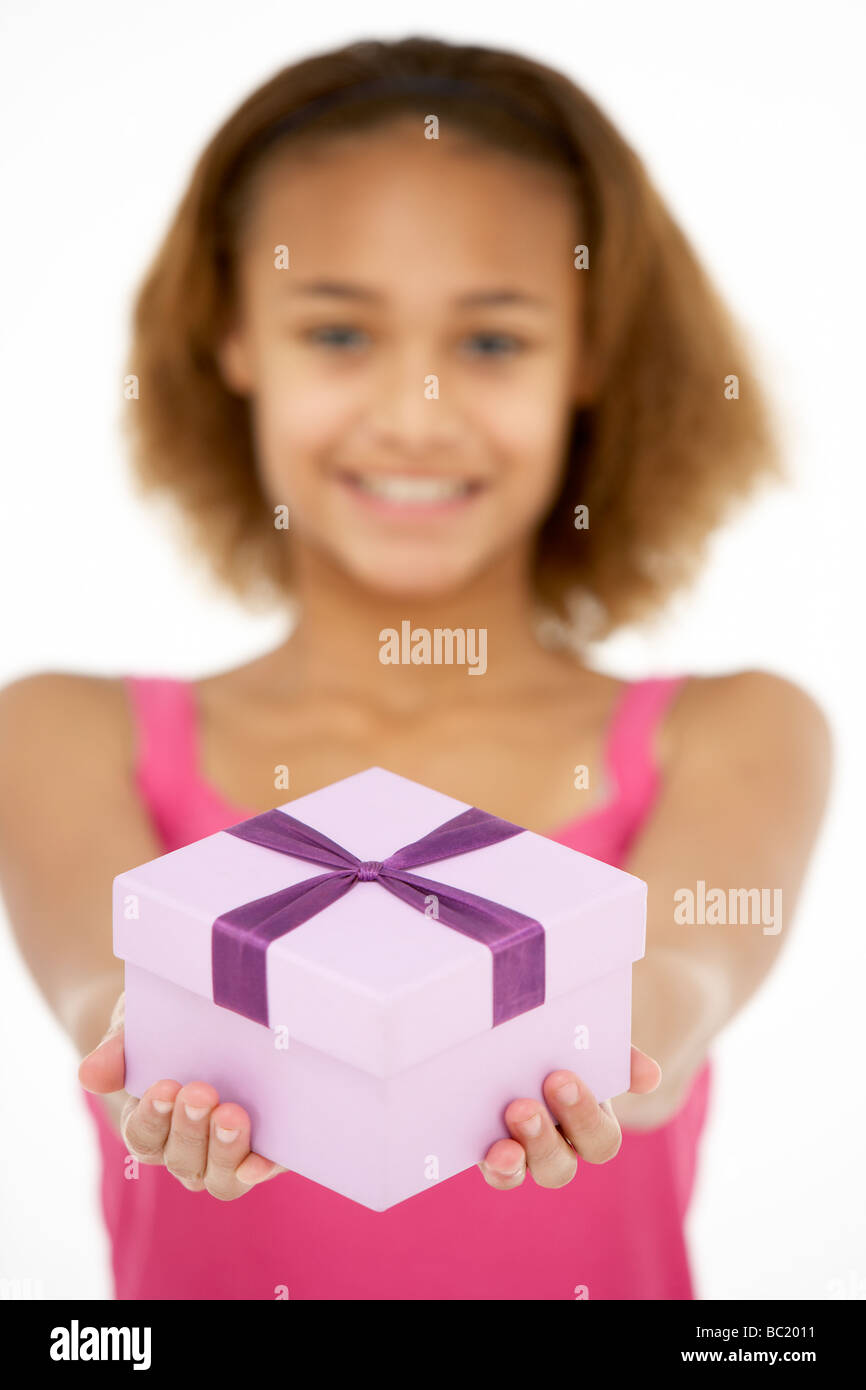 Young Girl Holding Wrapped Gift Stock Photo - Alamy