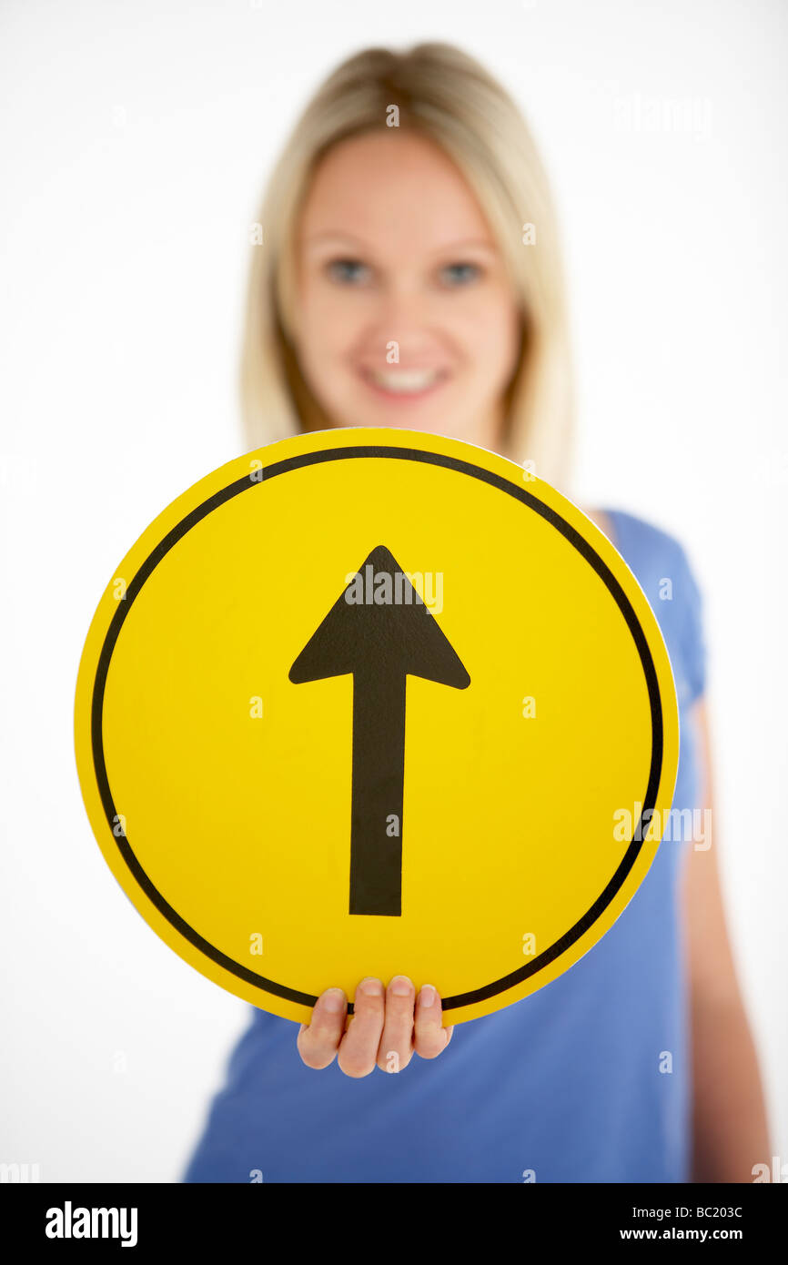 Woman Holding Road Traffic Sign Stock Photo - Alamy