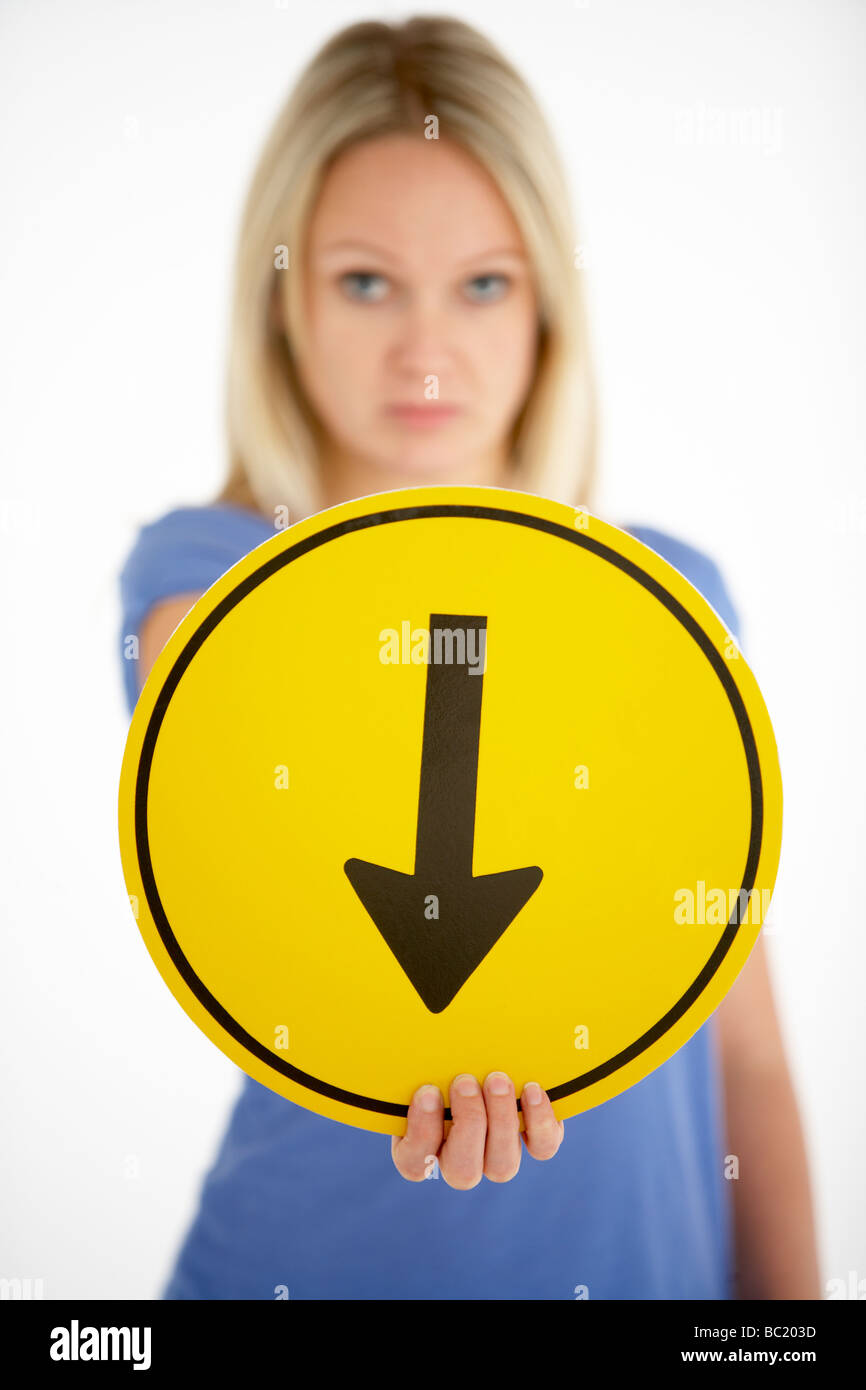 Woman Holding Road Traffic Sign Stock Photo - Alamy