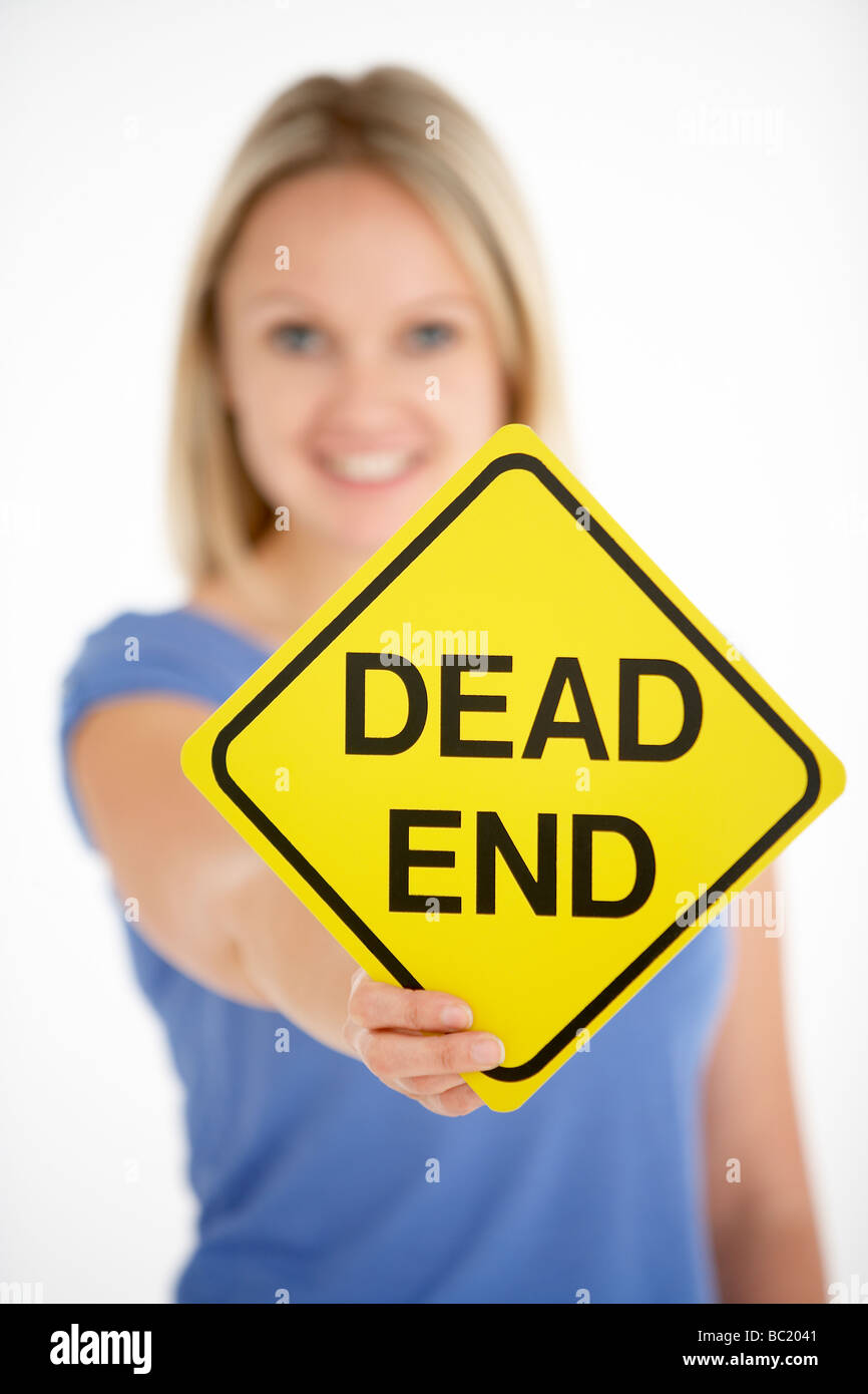 Woman Holding Road Traffic Sign Stock Photo - Alamy