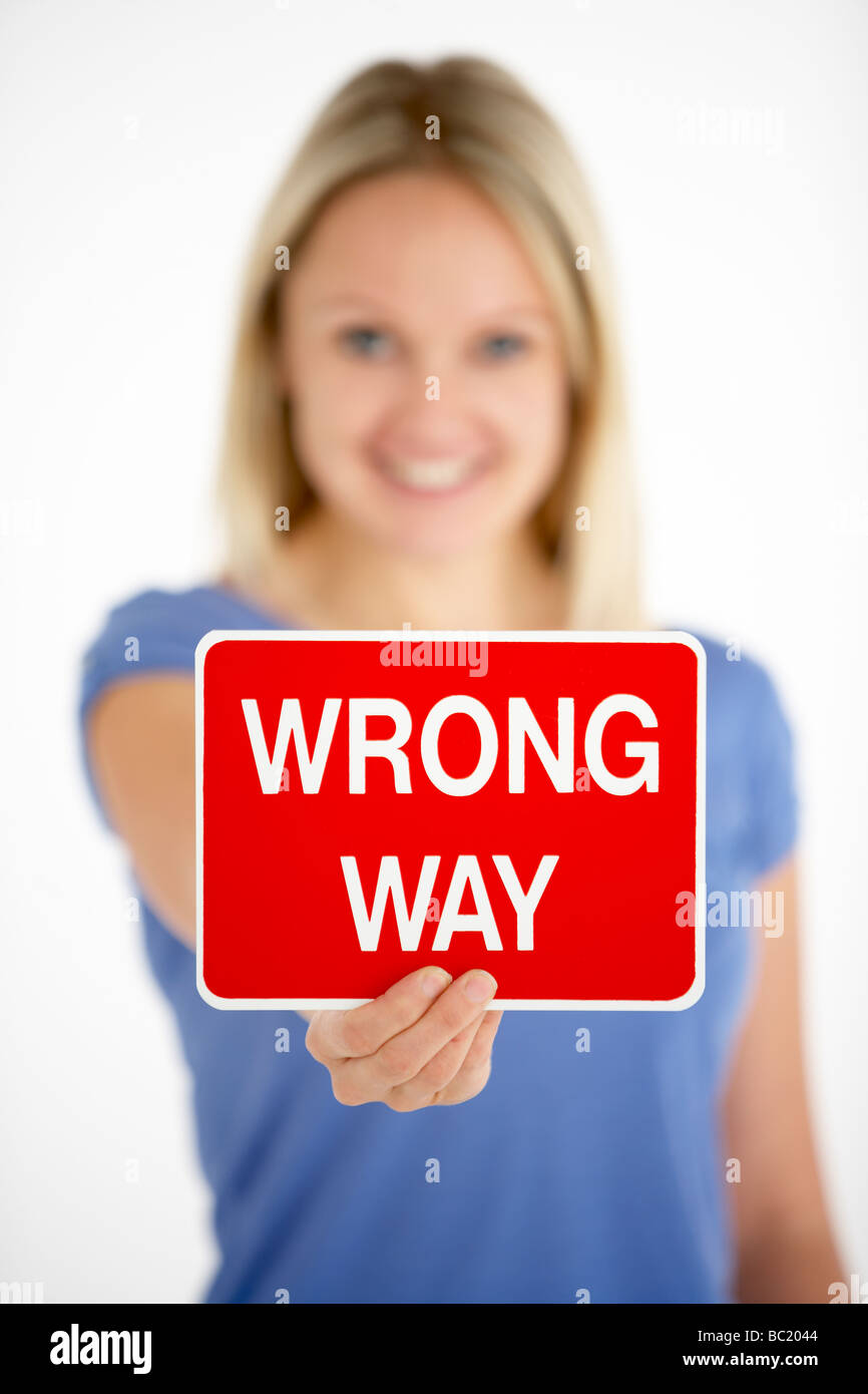 Woman Holding Road Traffic Sign Stock Photo - Alamy
