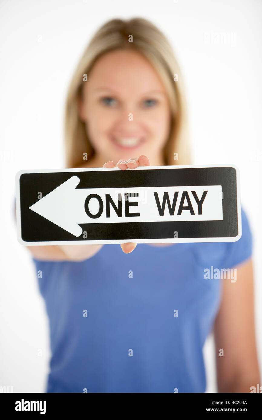 Woman Holding Road Traffic Sign Stock Photo - Alamy