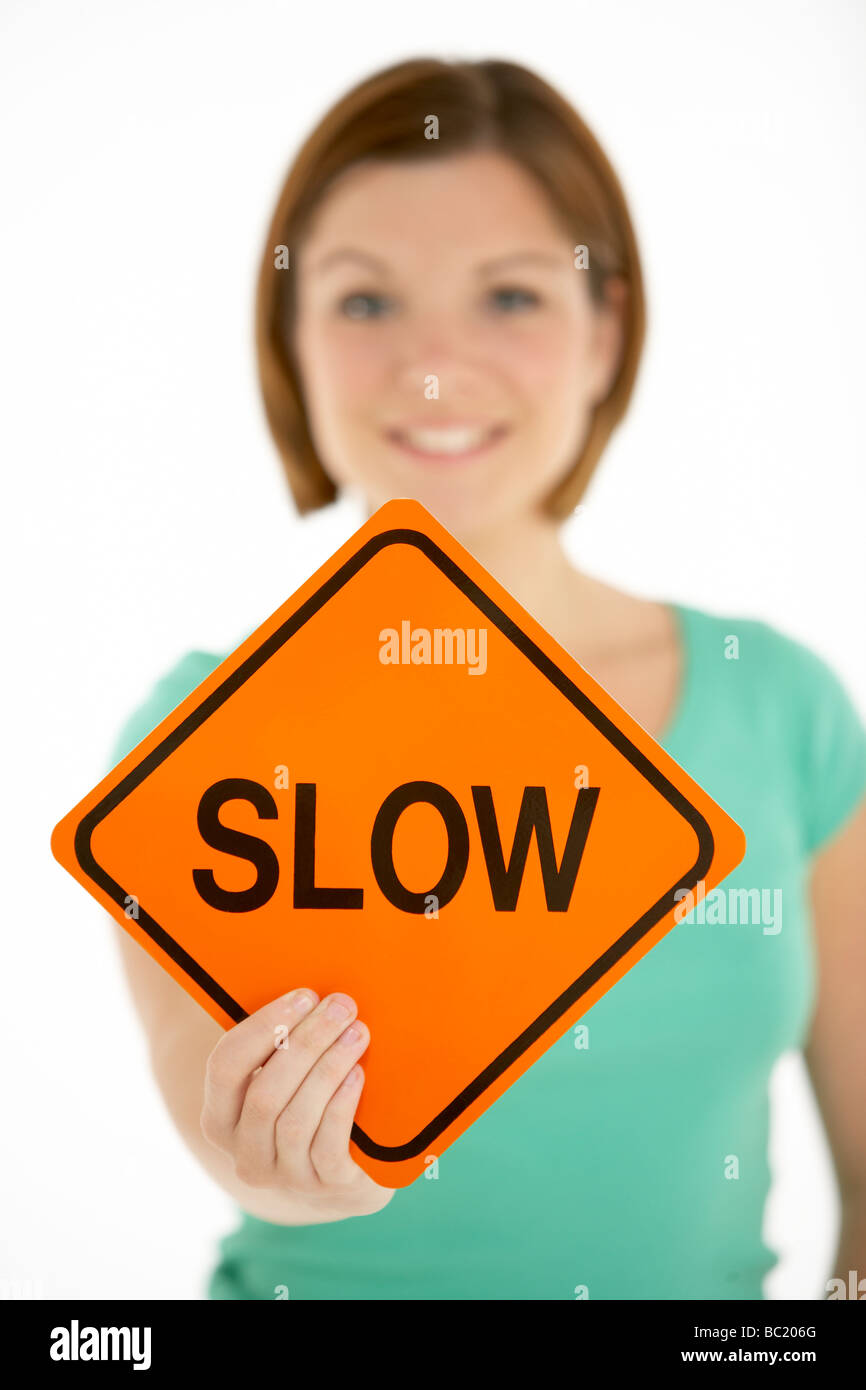 Woman Holding Road Traffic Sign Stock Photo - Alamy