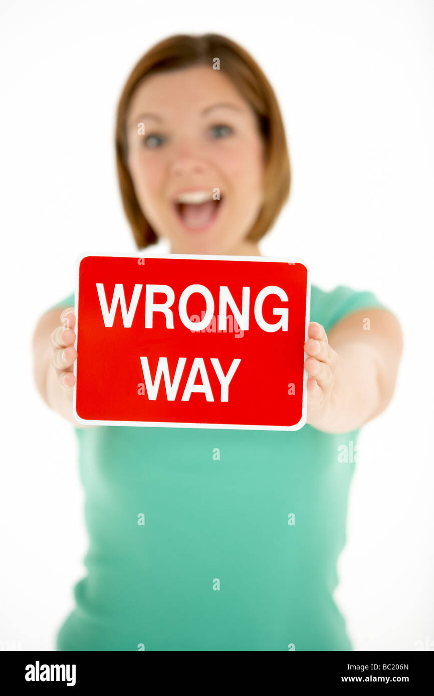 Woman Holding Road Traffic Sign Stock Photo - Alamy
