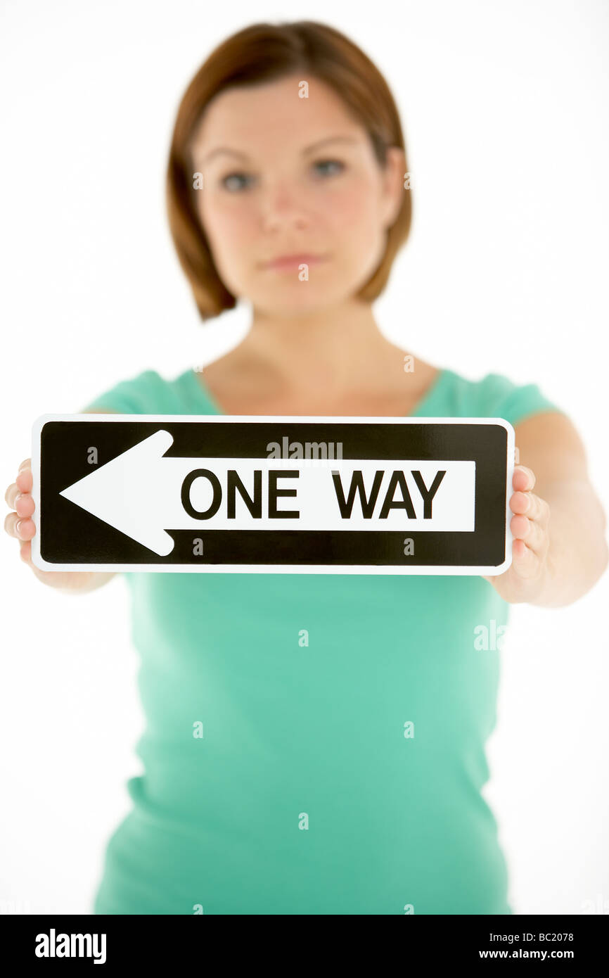Woman Holding Road Traffic Sign Stock Photo - Alamy