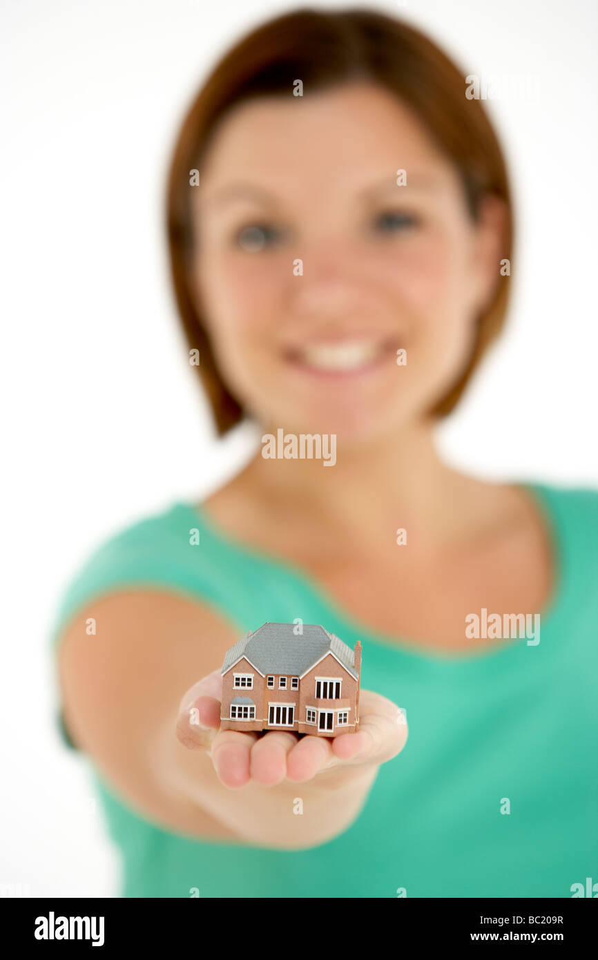 Woman Holding Model House Stock Photo - Alamy